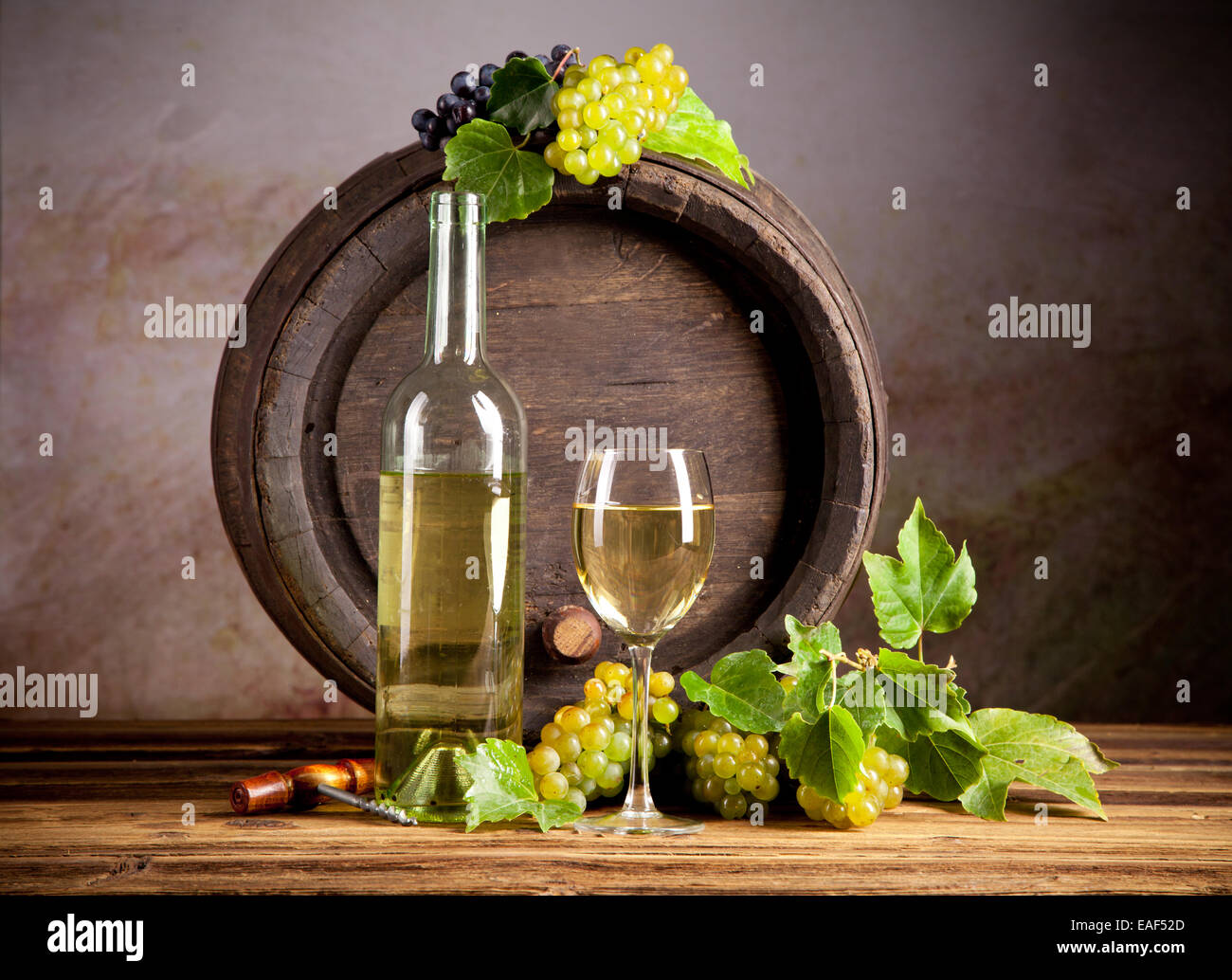 Still life of wine with wooden keg Stock Photo - Alamy