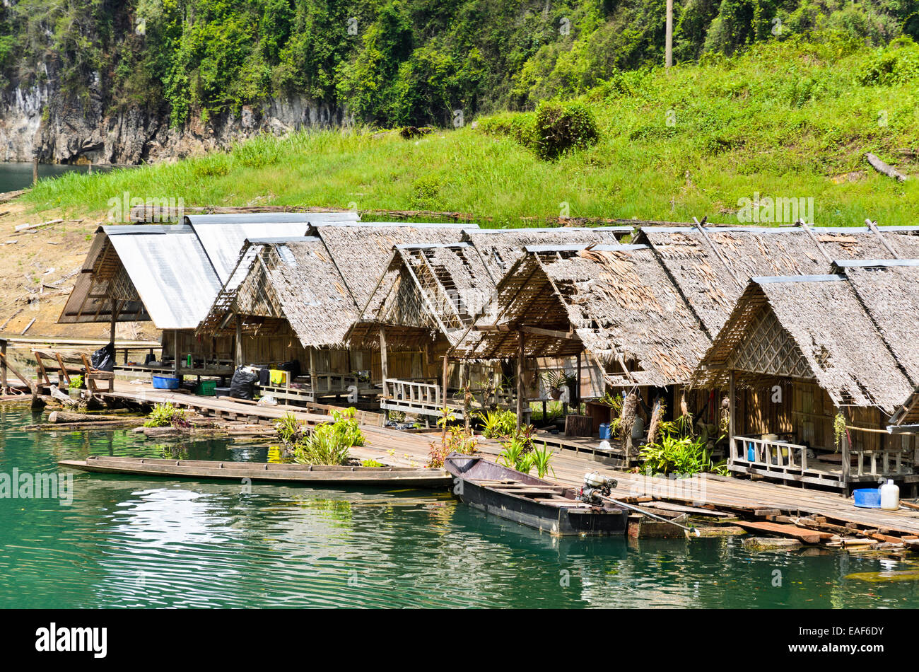 Floating home of the forest staff, Motor raft wharf in Ratchaprapha Dam ...