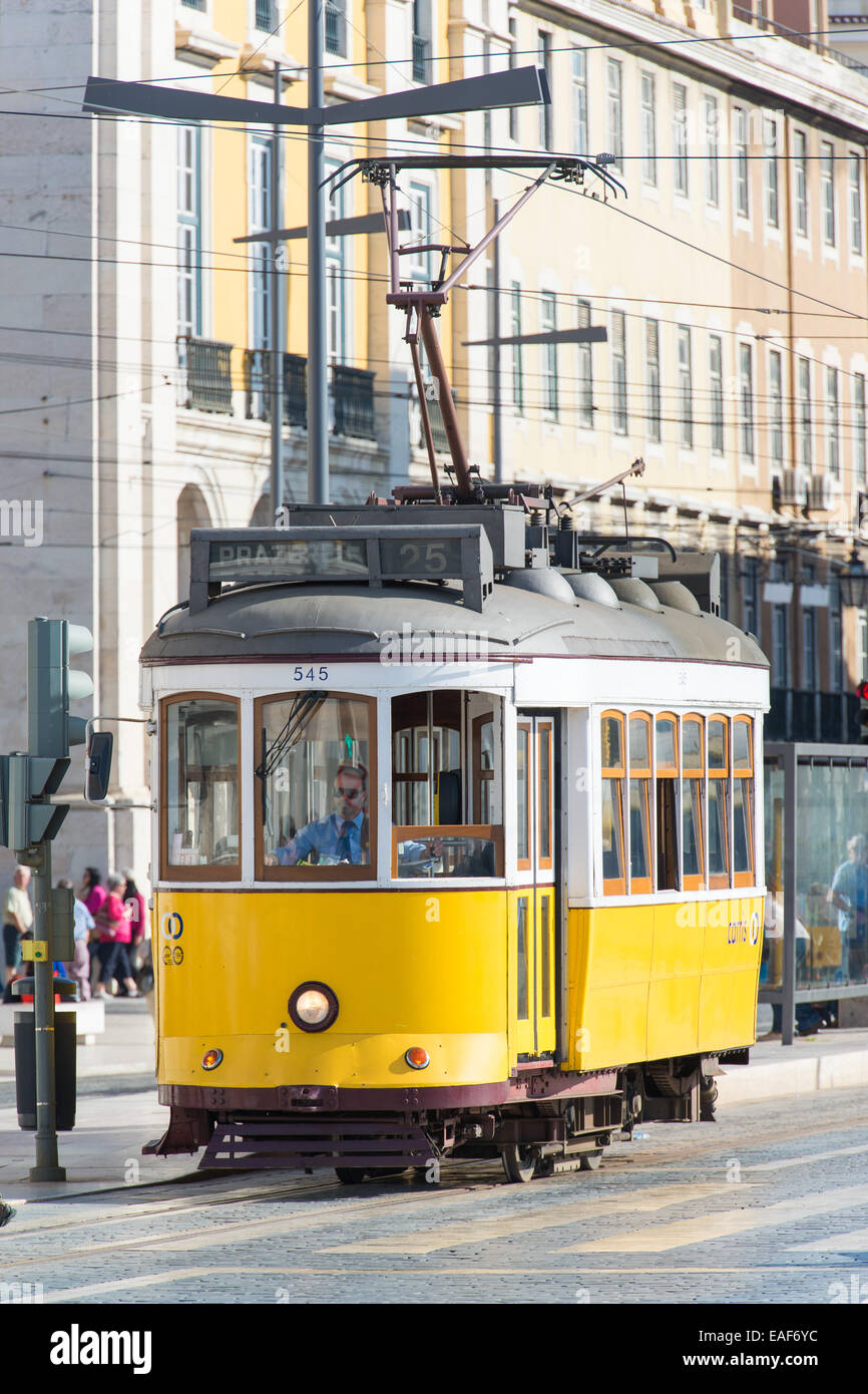 A traditional yellow tram in Lisbon, Portugal Stock Photo - Alamy