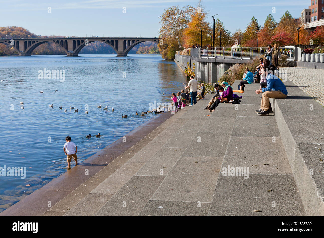 Children and families playing at Georgetown waterfront - Washington, DC ...