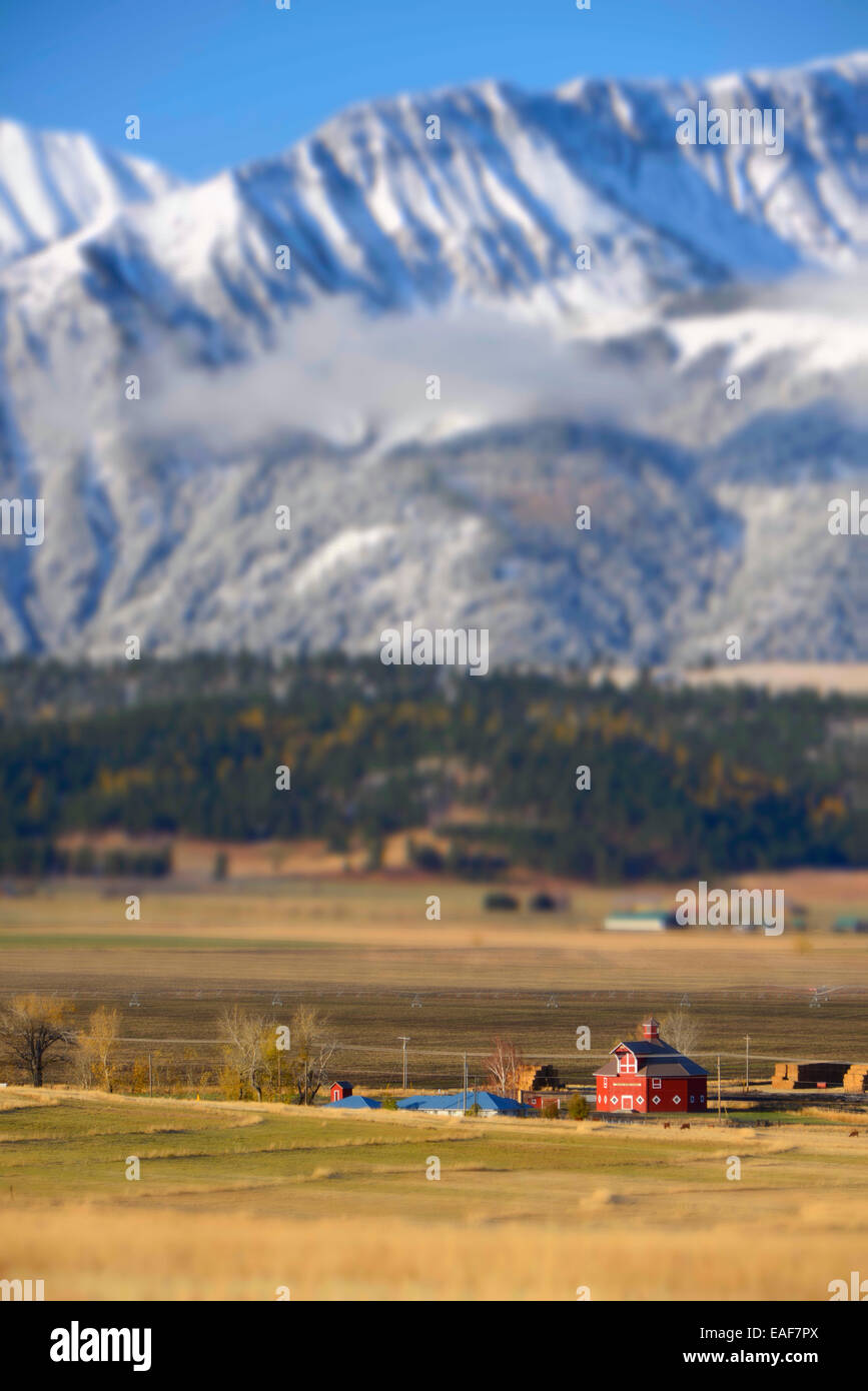 Artistic rendition a ranch in Oregon's Wallowa Valley with fresh snow ...