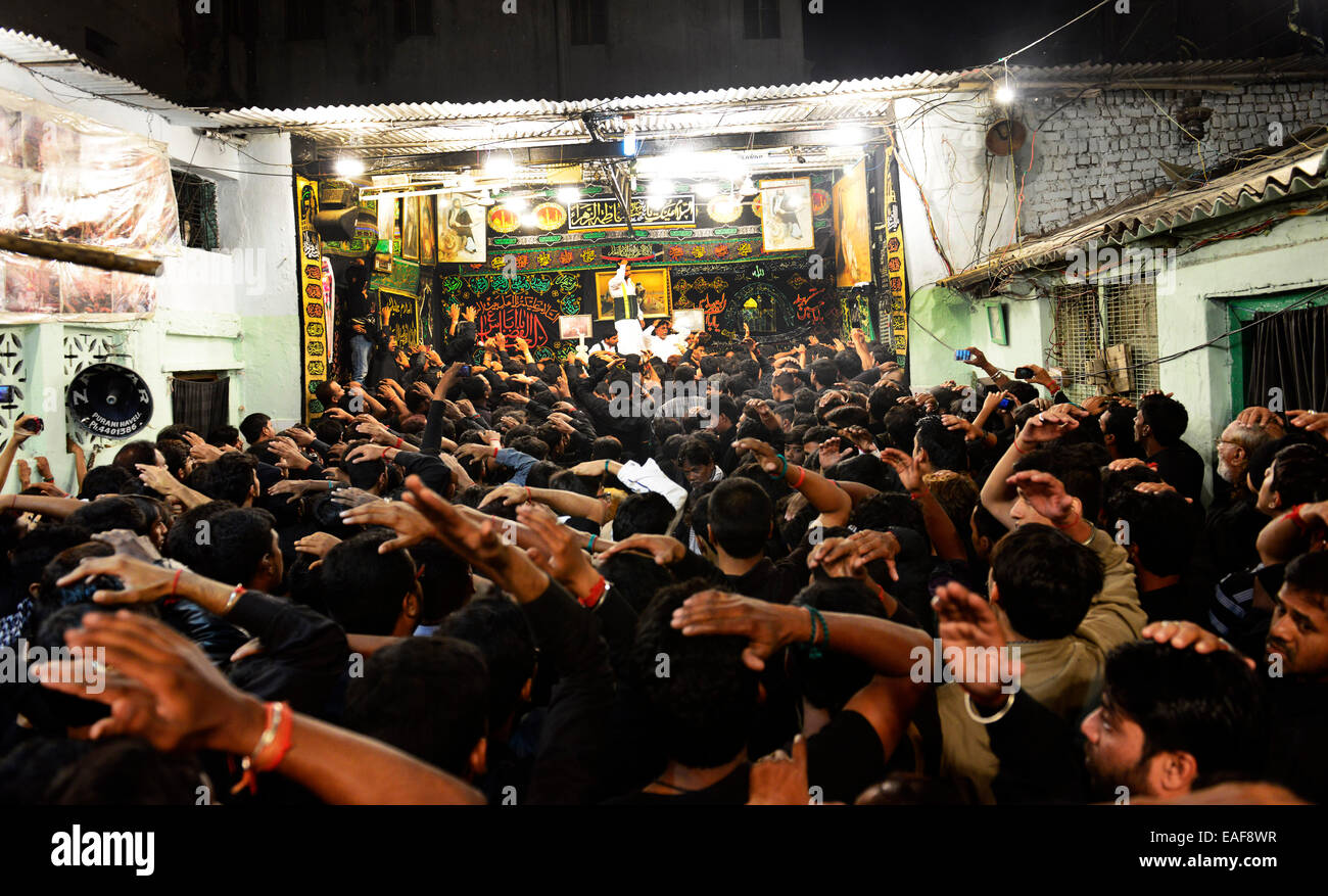 Shia men flog their heads during a mourning ceremony on the 8th day of ...