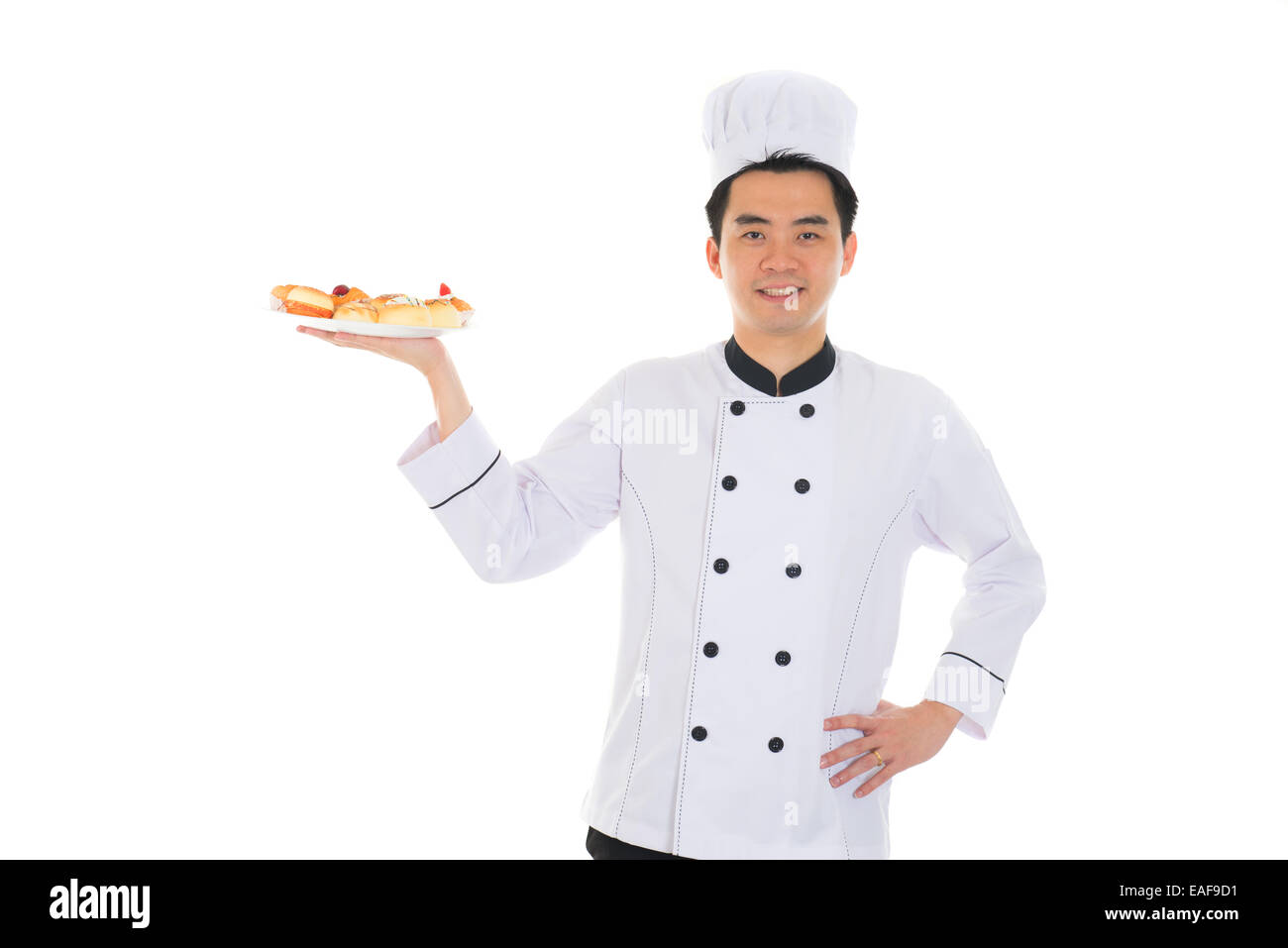 asian chinese male chef holding foods Stock Photo - Alamy
