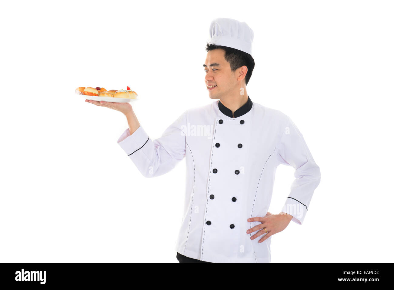 asian chinese male chef holding foods Stock Photo - Alamy