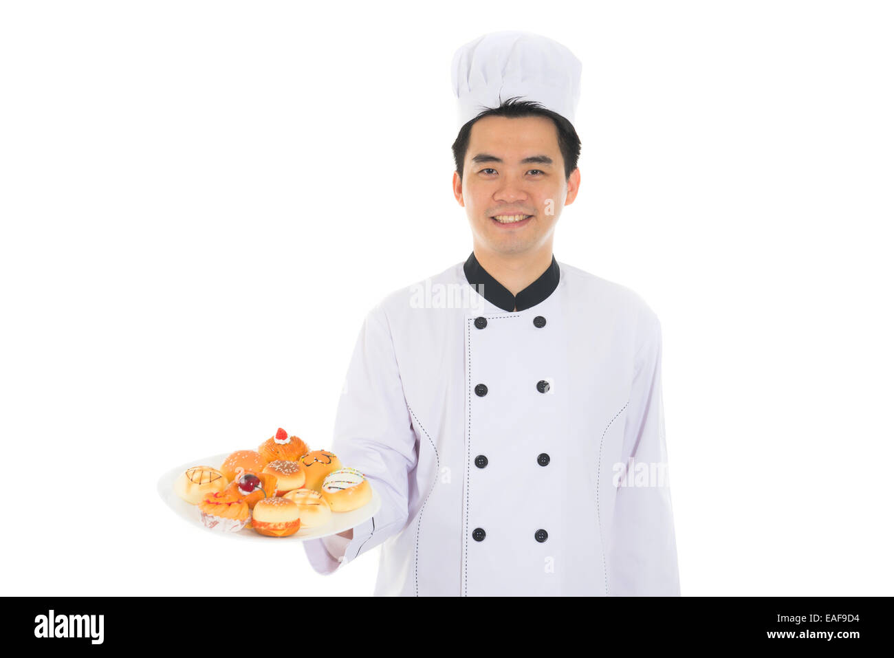 asian chinese male chef holding foods Stock Photo - Alamy