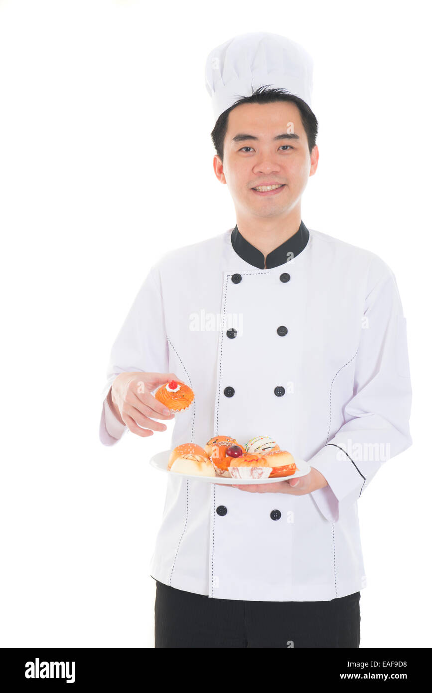 asian chinese male chef holding foods Stock Photo - Alamy