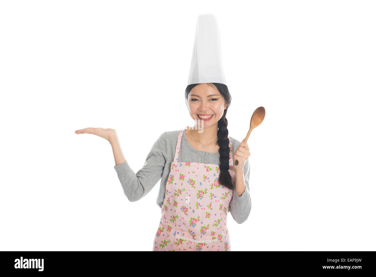 asian female chef holding a plate in casual Stock Photo - Alamy