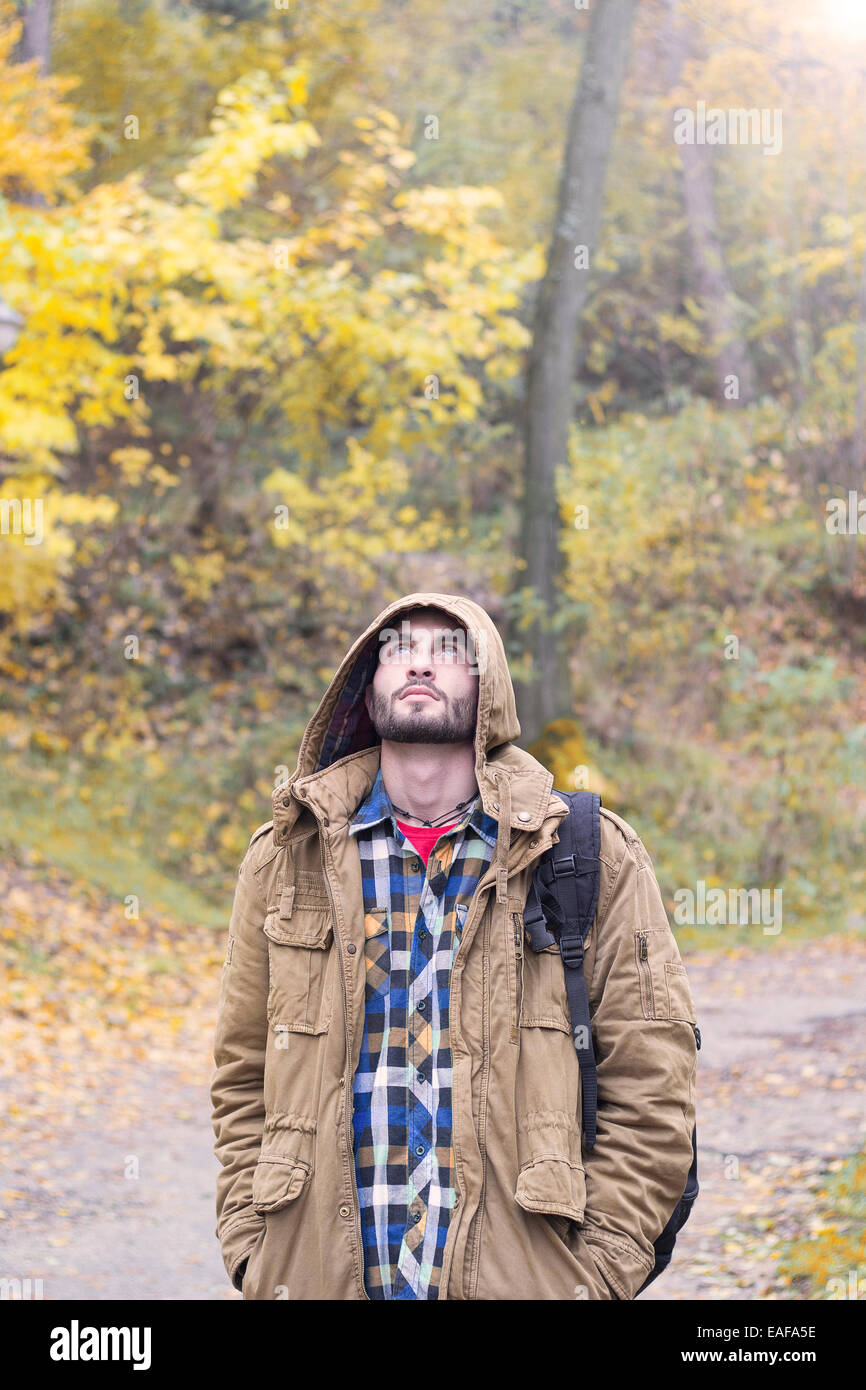 Young man looking up Stock Photo - Alamy