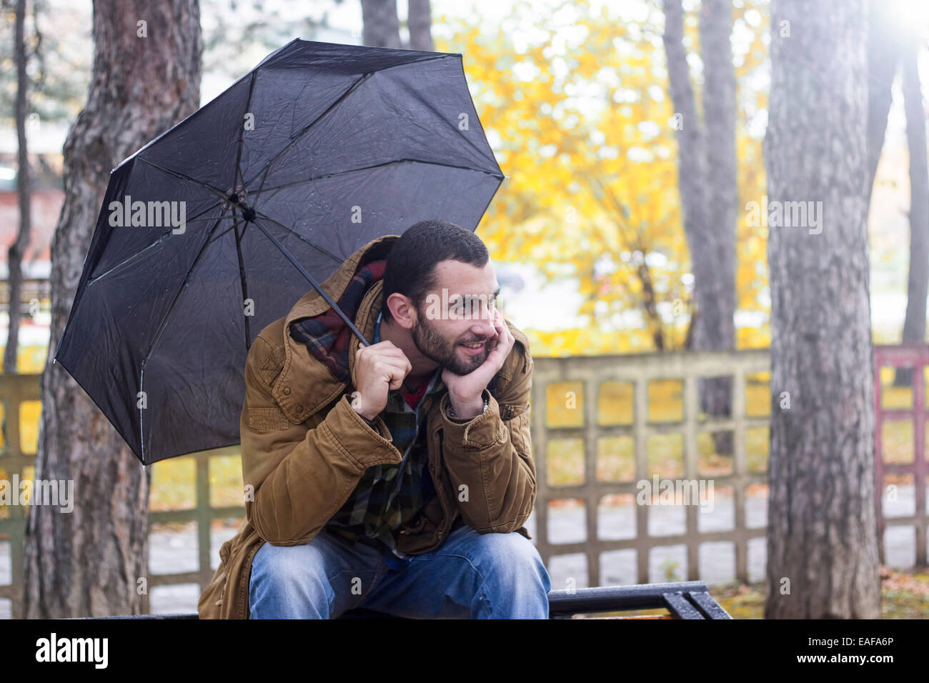 Sad man sitting on bench hi-res stock photography and images - Alamy