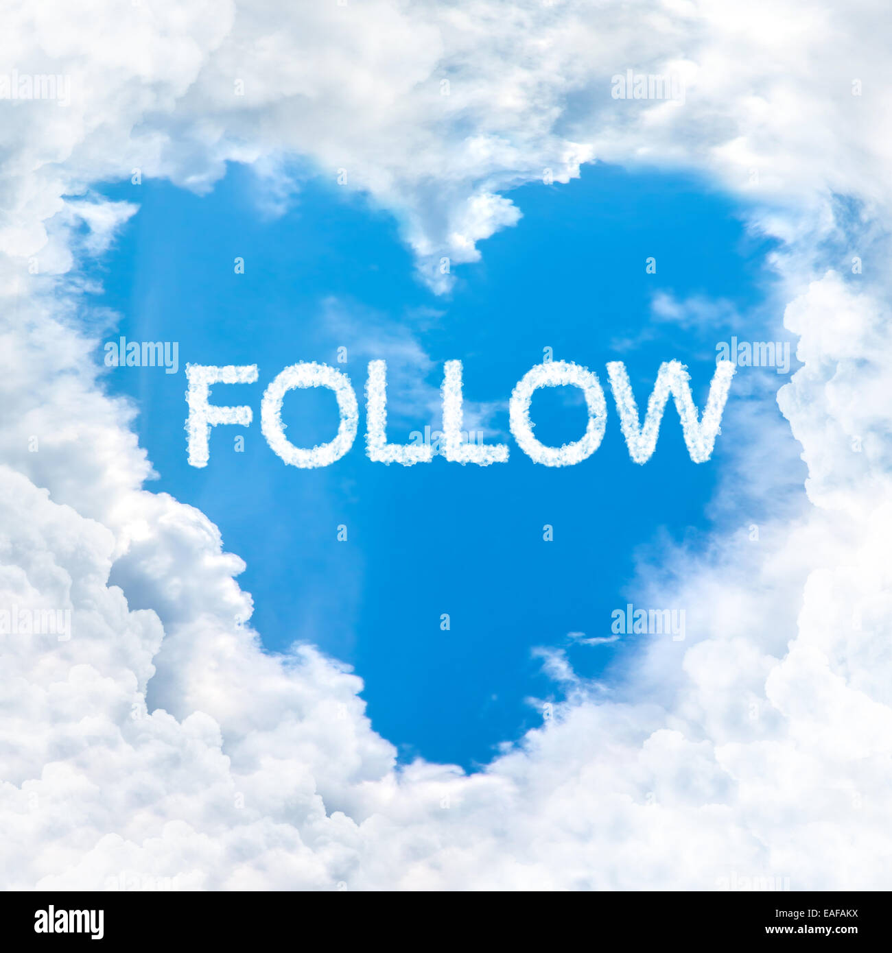 follow word inside heart cloud blue sky background only Stock Photo - Alamy