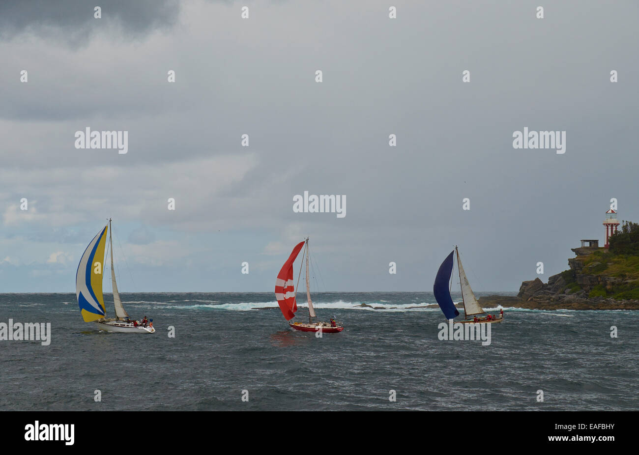 Manly heads sydney harbour 3 sailing vessels setting sail hi-res stock ...