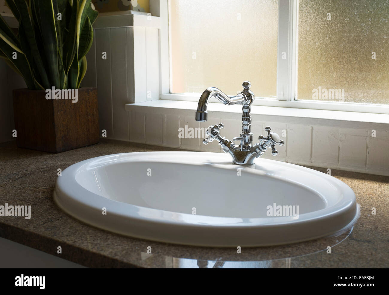 Old retro water tap basin in modern bathroom toilet with window Stock ...