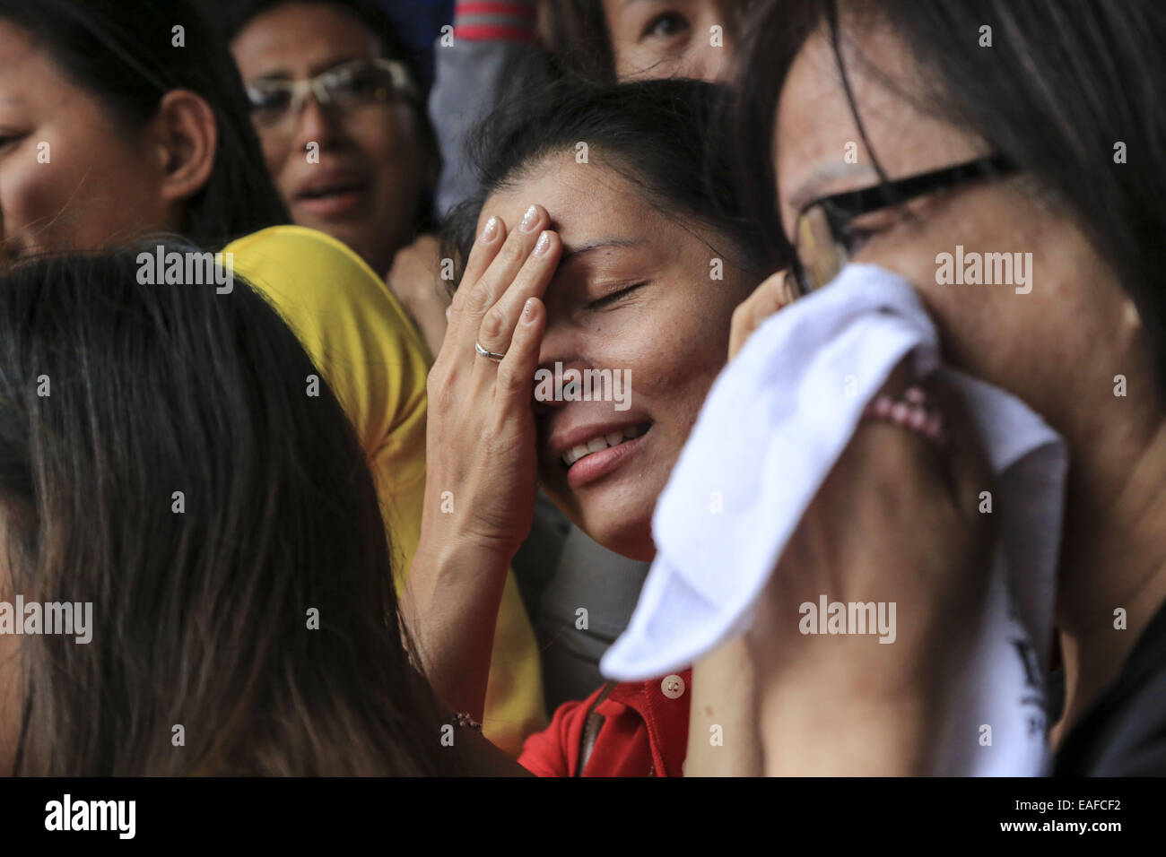 Manila, Philippines. 18th Jan, 2015. People crying after they seen the ...