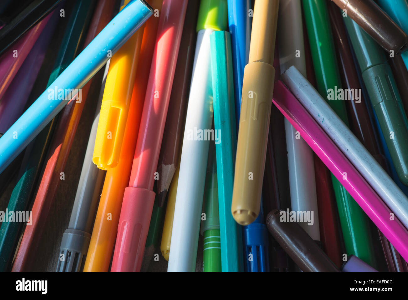Multicolor markers for drawing. Scattered markers Stock Photo - Alamy