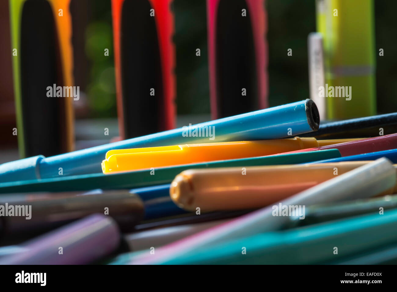 Multicolor markers for drawing. Scattered markers Stock Photo - Alamy