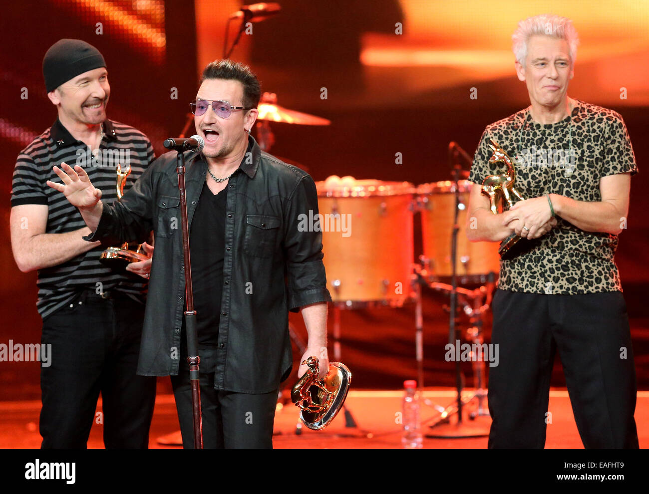Berlin, Germany. 13th Nov, 2014. Members of the Irish band U2 Bono (C ...
