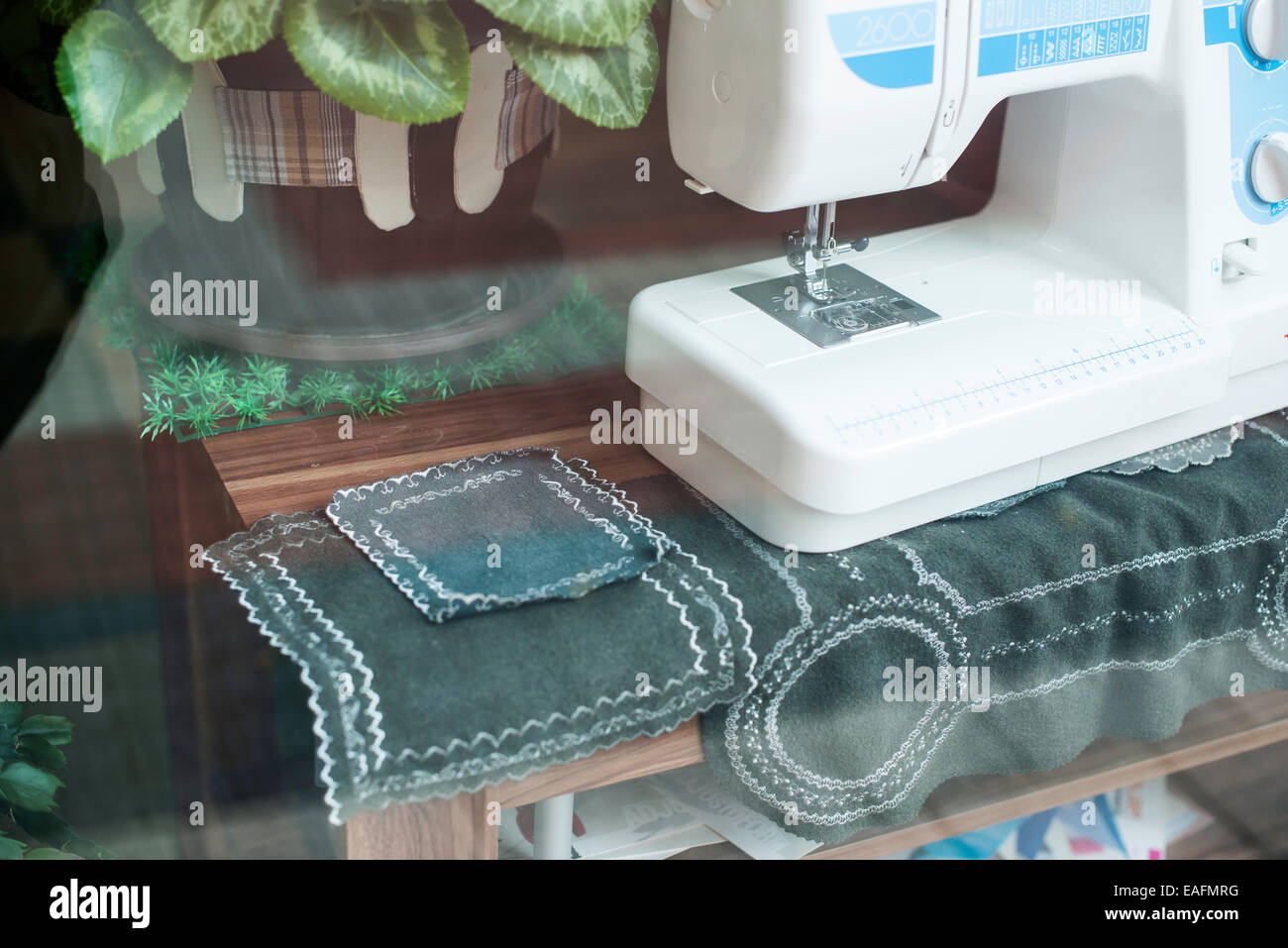 Sewing machine on a shop window Stock Photo - Alamy