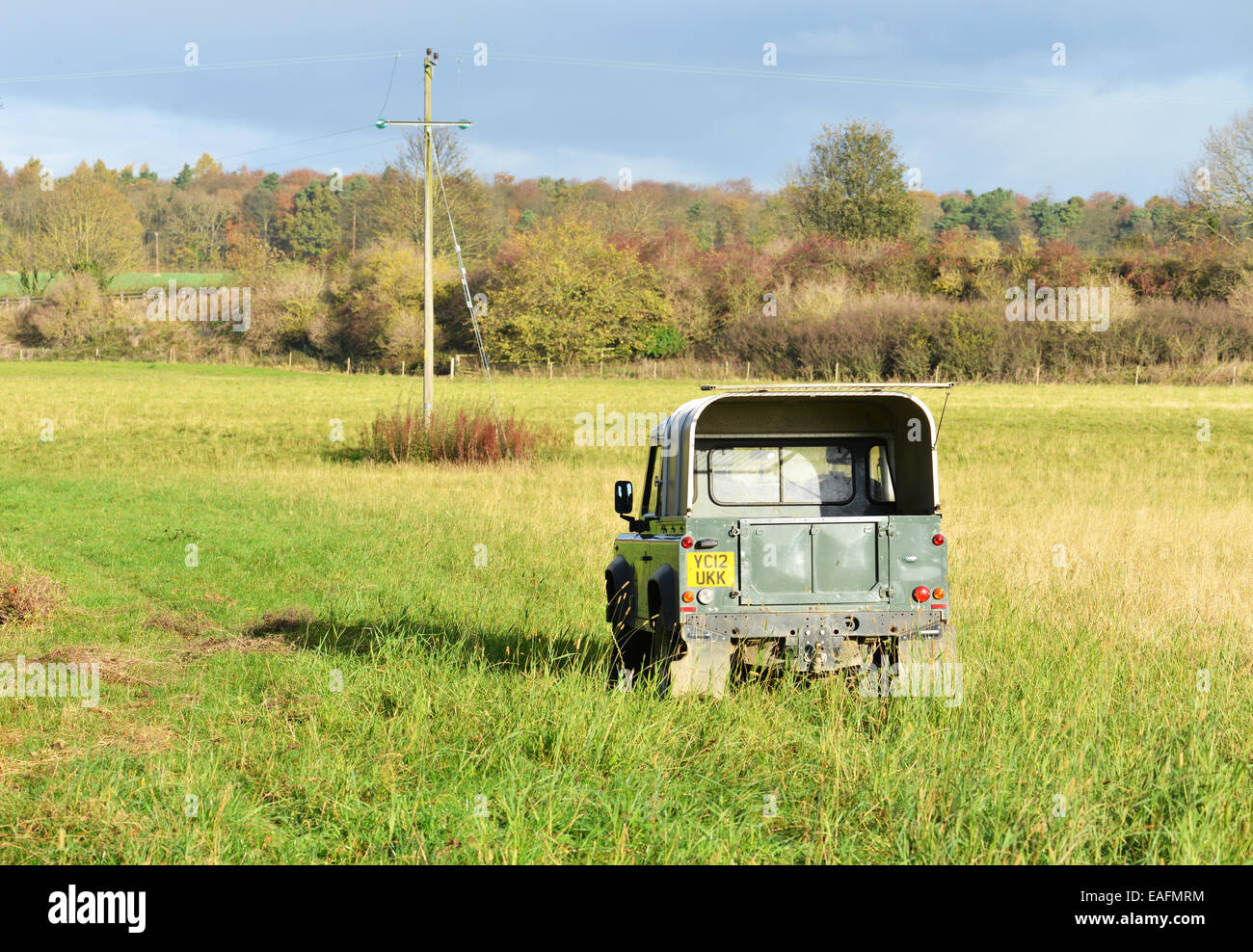 Land Rover farming vehicle parked in a field Stock Photo - Alamy