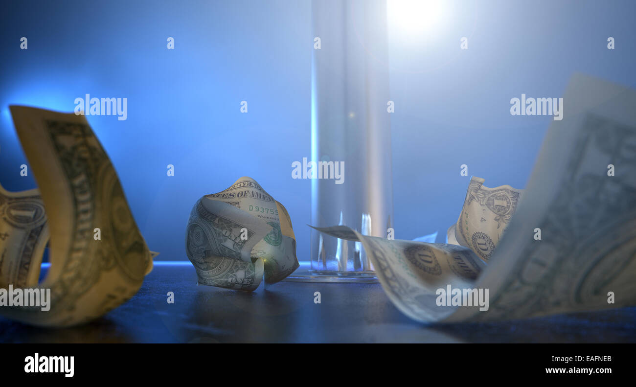 An isolated stripper pole on a stage lit by a single spotlight ...