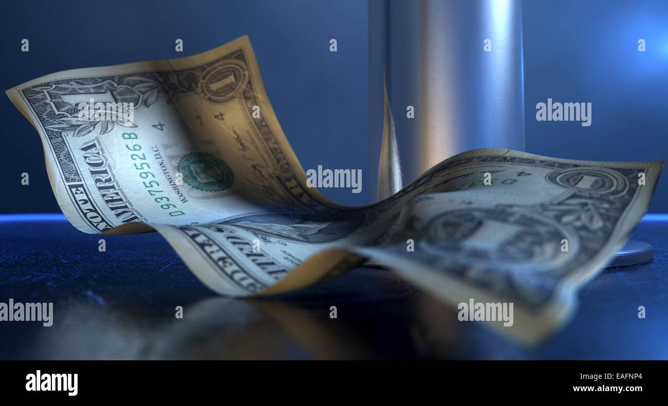 An isolated stripper pole on a stage lit by a single spotlight with ...