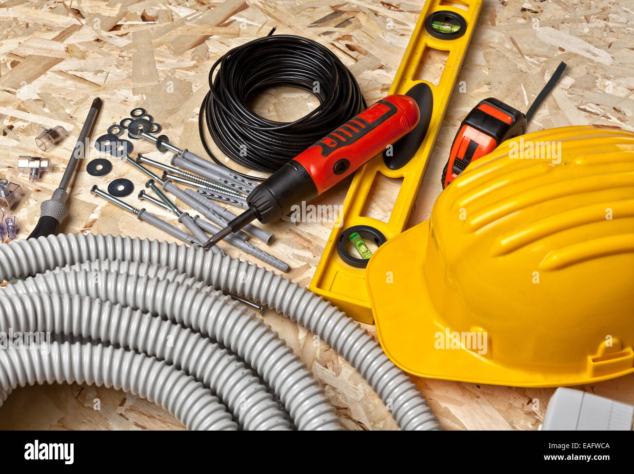 electrician tools on osb wood background Stock Photo - Alamy
