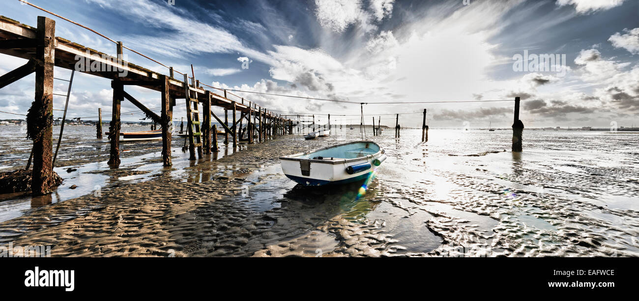 Tranquil small boats moored at jetty hi-res stock photography and ...