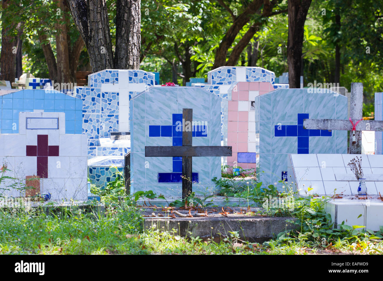 Cemetery tombstone on Christian graveyard in Thailand Stock Photo - Alamy