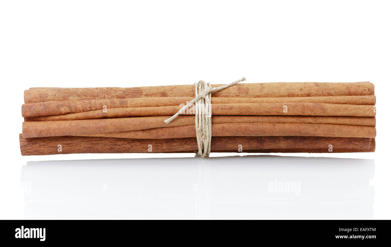 tied cinnamon cassia sticks, isolated on white background Stock Photo ...