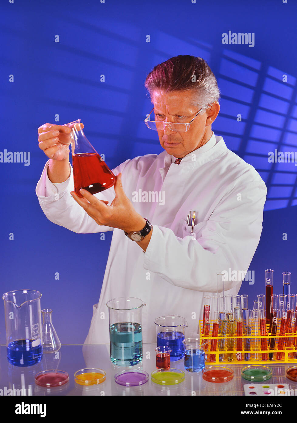 Man in the laboratory with test tube Stock Photo - Alamy