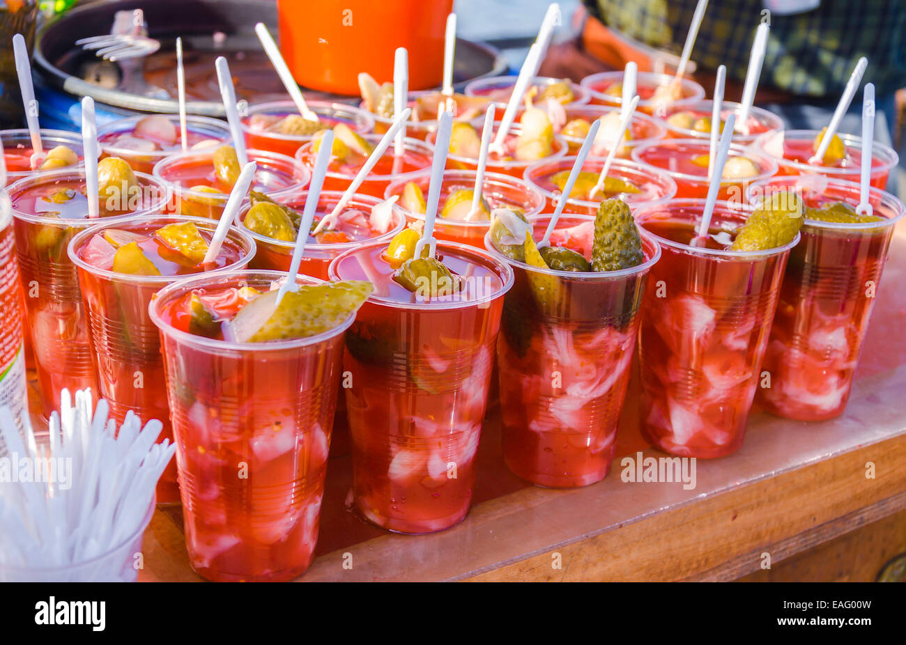 Sour turnip juice, with pickled cabbage and cucumbers, as sold by the ...