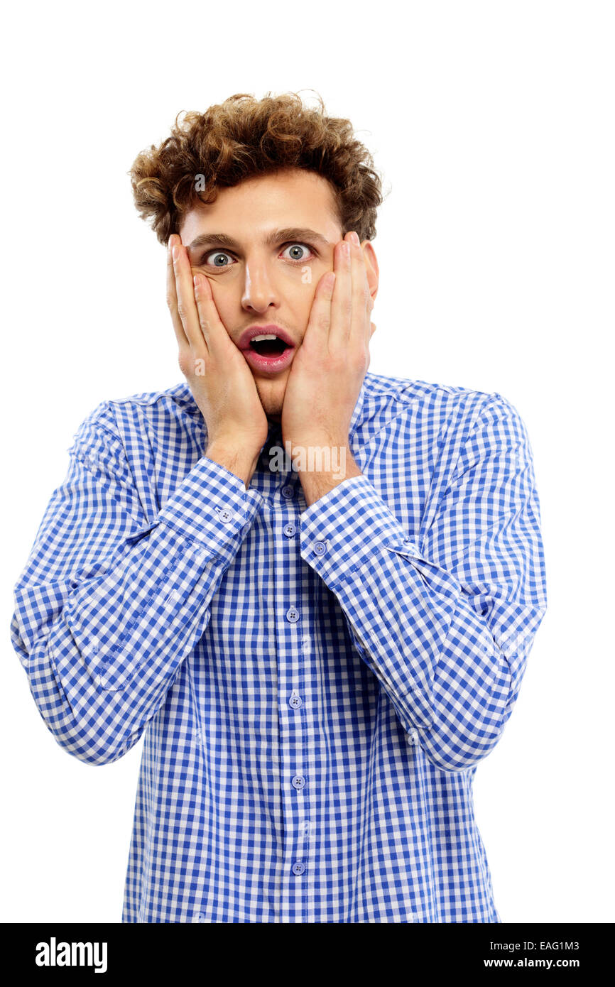 Surprised young man isolated on the white background Stock Photo - Alamy
