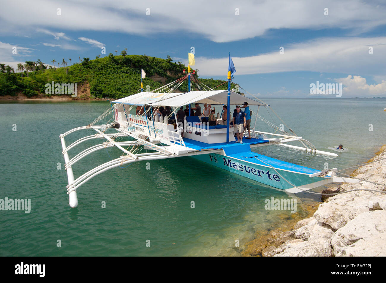 Traditional Philippine boat bangca (outrigger canoe) Islands Malapaskua ...