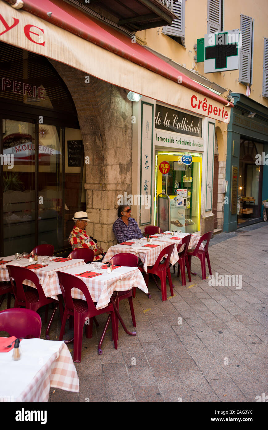 Two old french men sitting at a cafe on place Rossetti, Nice vieille ...