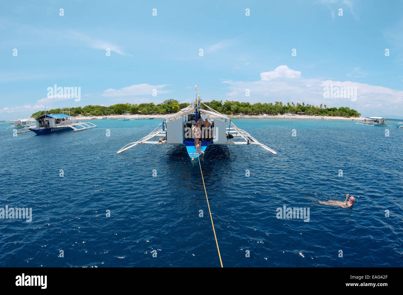 Traditional Philippine boat bangca (outrigger canoe) Islands Malapaskua ...