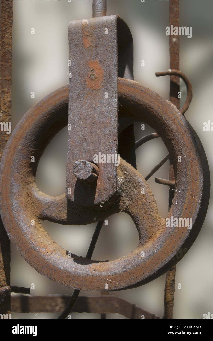 antique objects: old and rusty pulley Stock Photo - Alamy