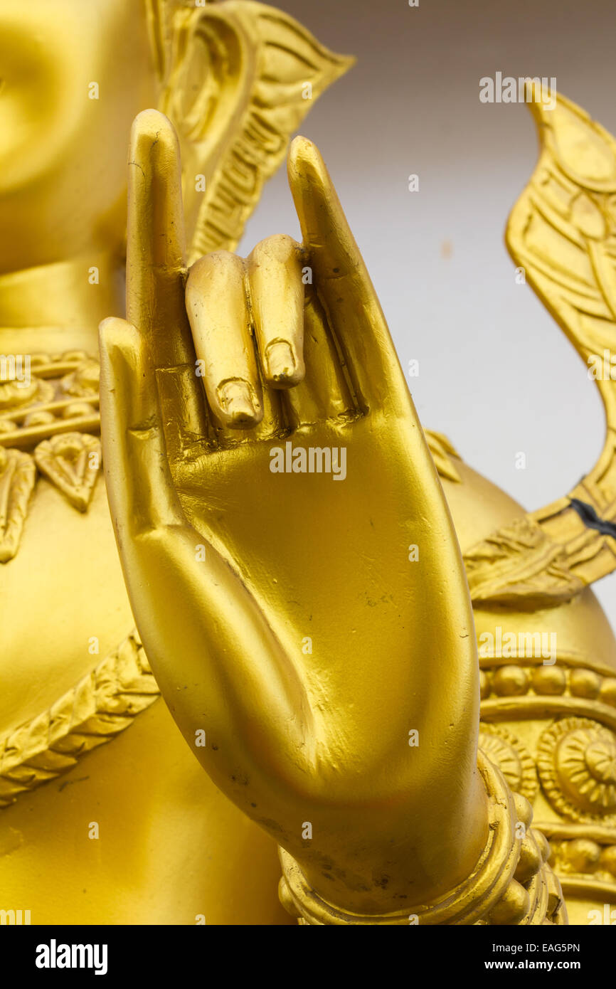 Hand of golden god statue Stock Photo - Alamy