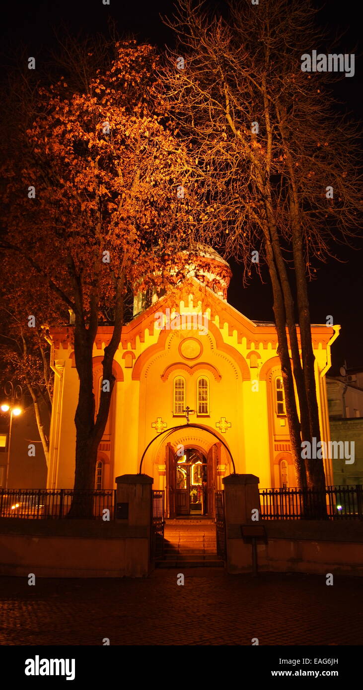 Vilnius,Lithuania. Orthodox church with trees are lighted at night ...
