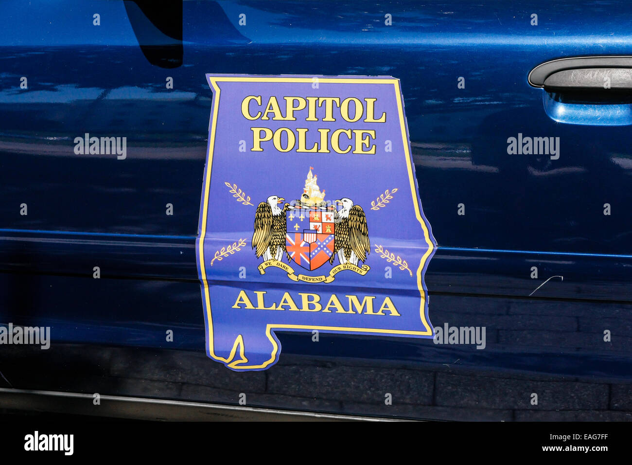Capitol Police Alabama badge on the door panel of a patrol vehicle ...