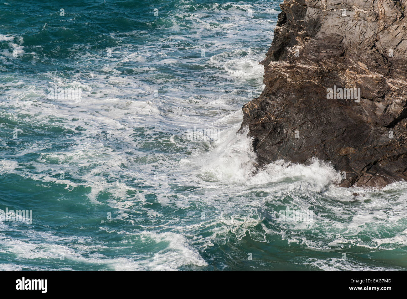 Waves crashing into cliffs on the rugged North Cornwall Coast Stock ...