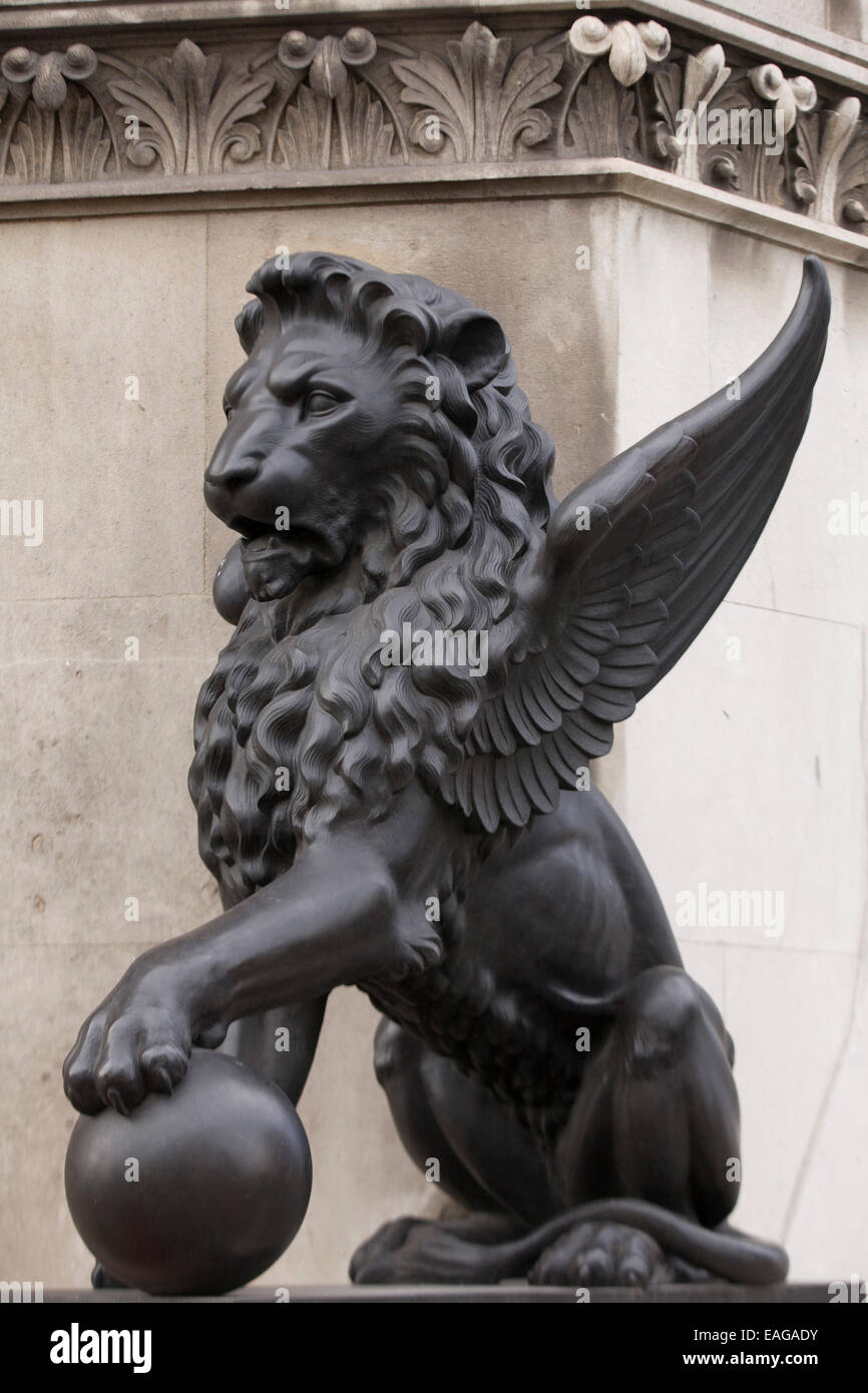 Lion statue with ball hi-res stock photography and images - Alamy