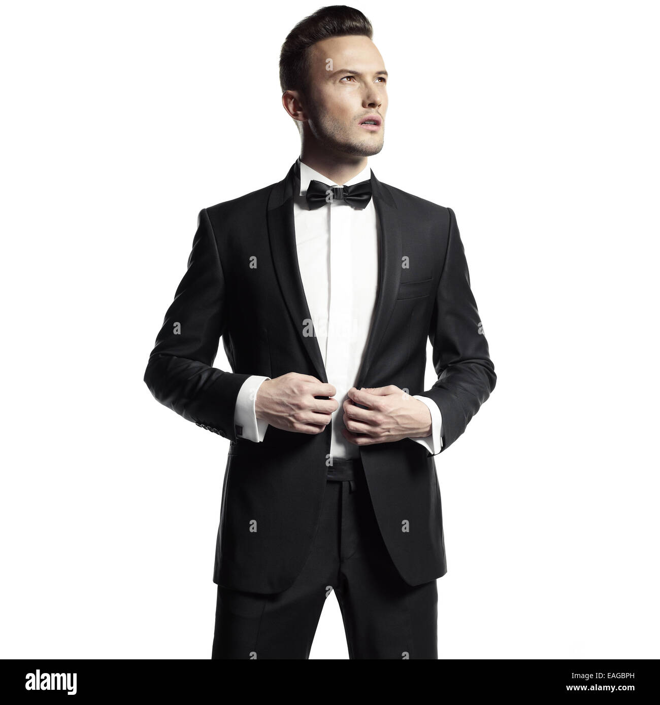 Portrait of handsome stylish man in elegant black suit Stock Photo - Alamy