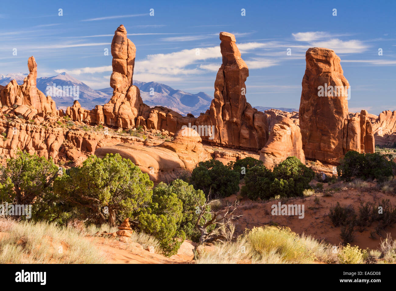 Four 'Marching Men' sandstone pillars in front of the La Sal Mountains ...