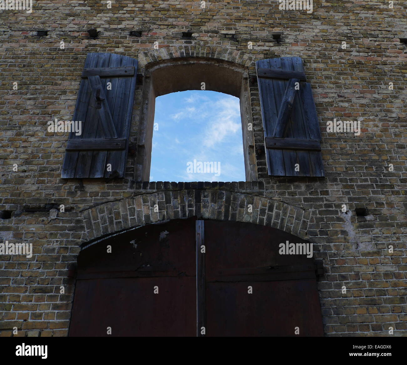 Arched wooden window overlooking the sky in riga Stock Photo - Alamy
