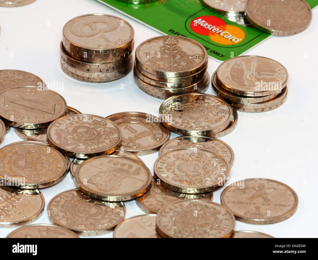 Bunch of coins with credit card - American express and mastercard Stock ...