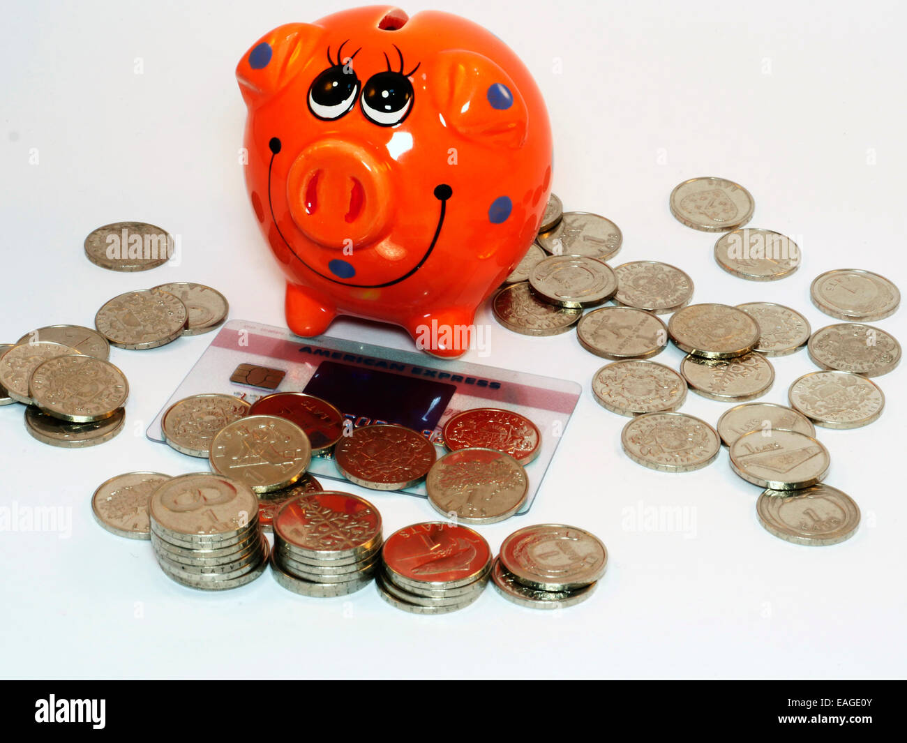Bunch of Latvian lat coins and piggy bank on white background Stock ...