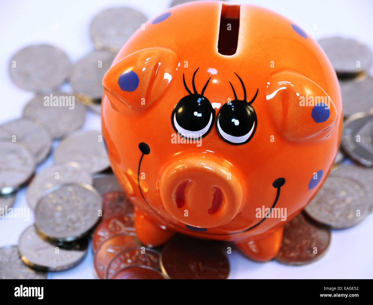 Bunch of Latvian lat coins and piggy bank on white background Stock ...