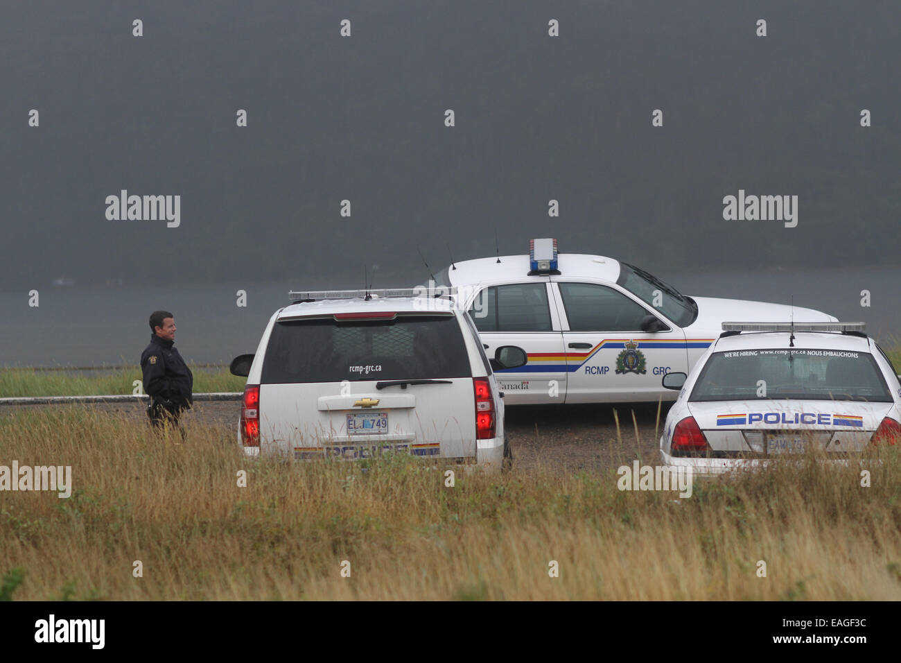 RCMP vehicles parked along the highway in Cape Breton, Nova Scotia ...