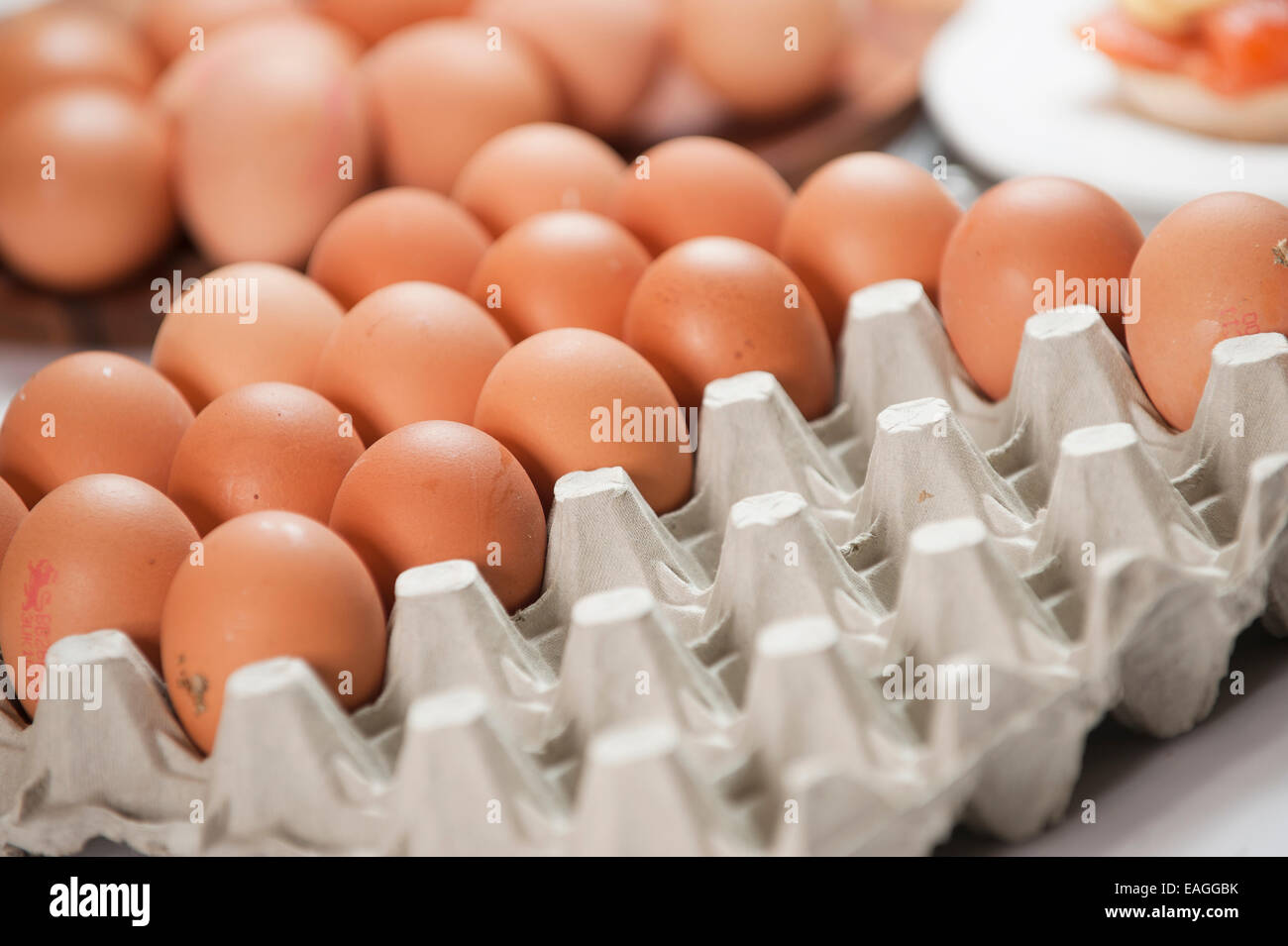 Eggs in a large egg box Stock Photo - Alamy