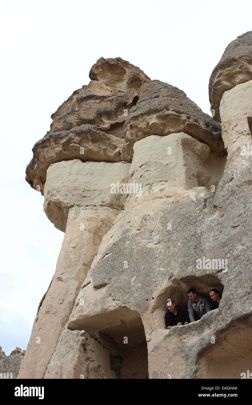 Fairy chimneys and tourists in Pasabag, Cappadocia, Turkey Stock Photo ...
