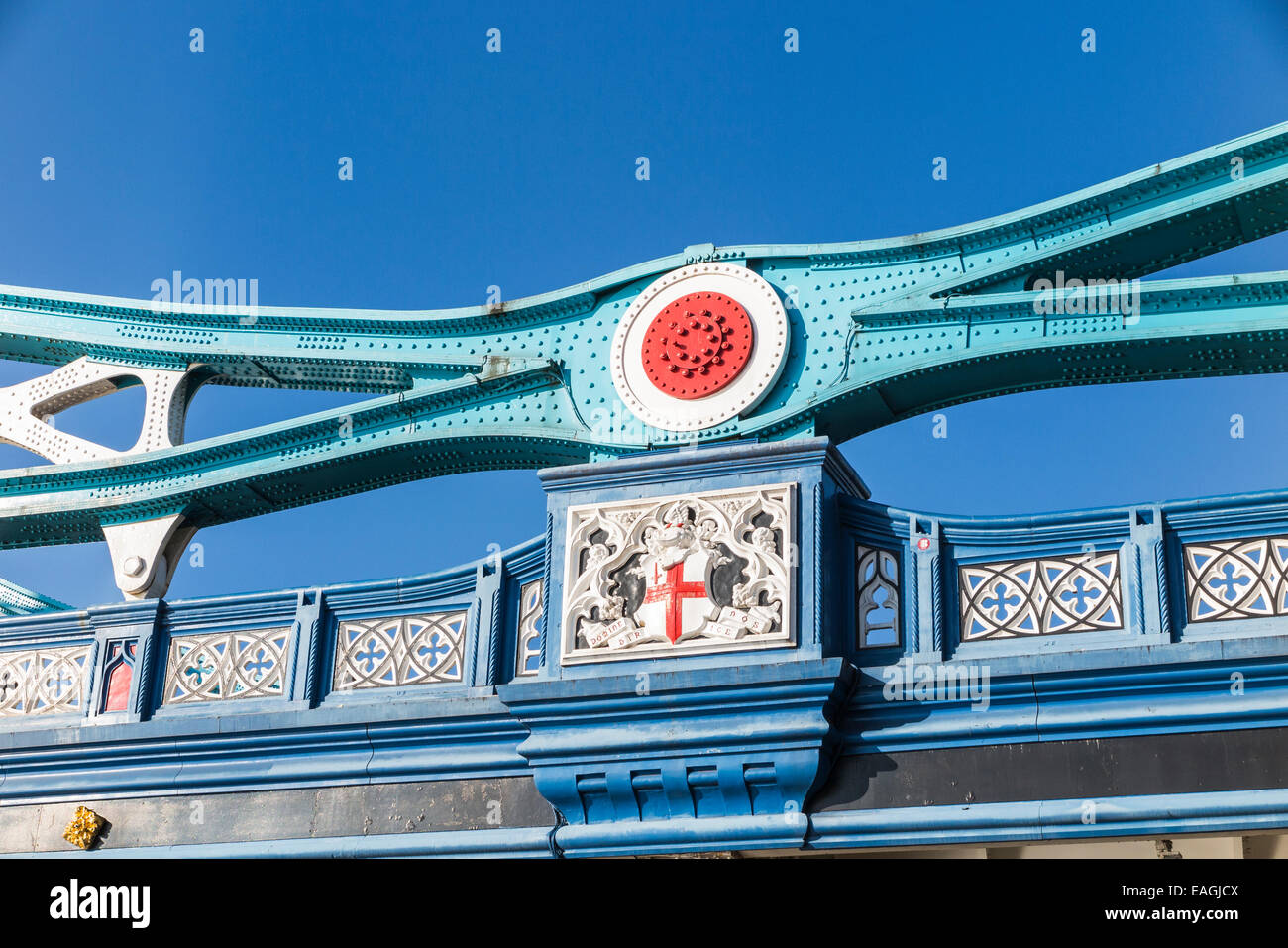 A colourful blue and red detail including crest at Tower Bridge, an ...